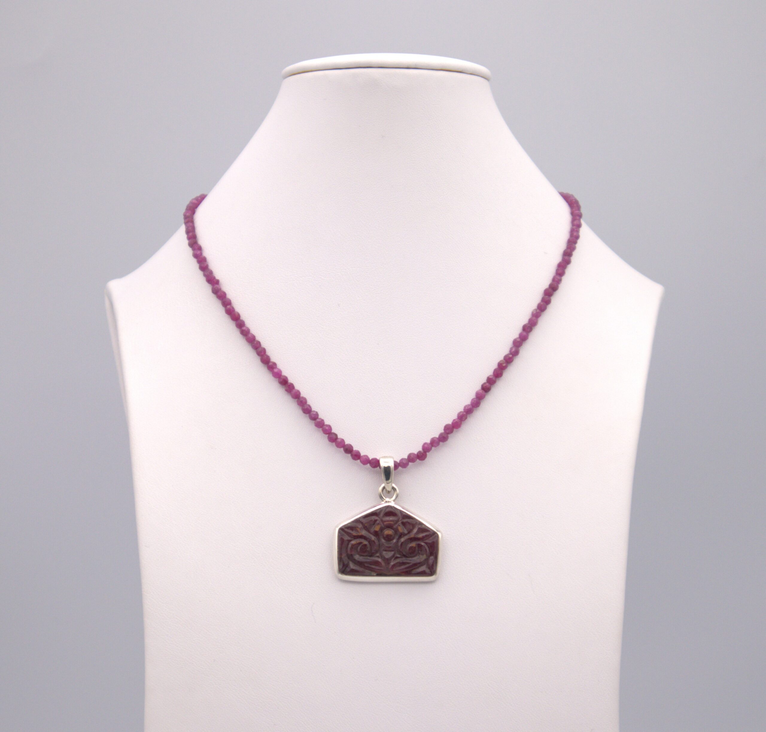 Carved Ruby house pendant - The Lizzadro Museum of Lapidary Art